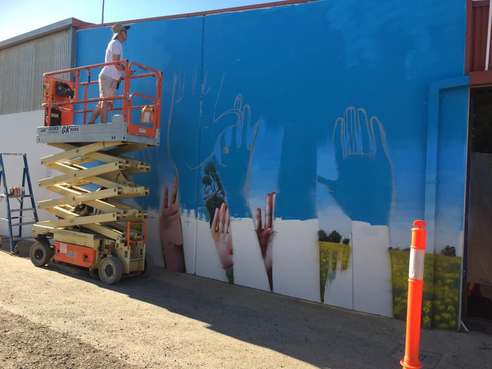 Teens put hands up to paint mural - Horsham Rural City Council